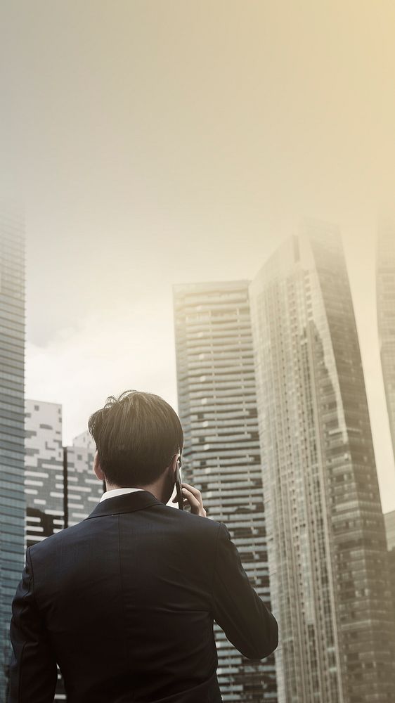 Young businessman phone city background | Premium Photo - rawpixel