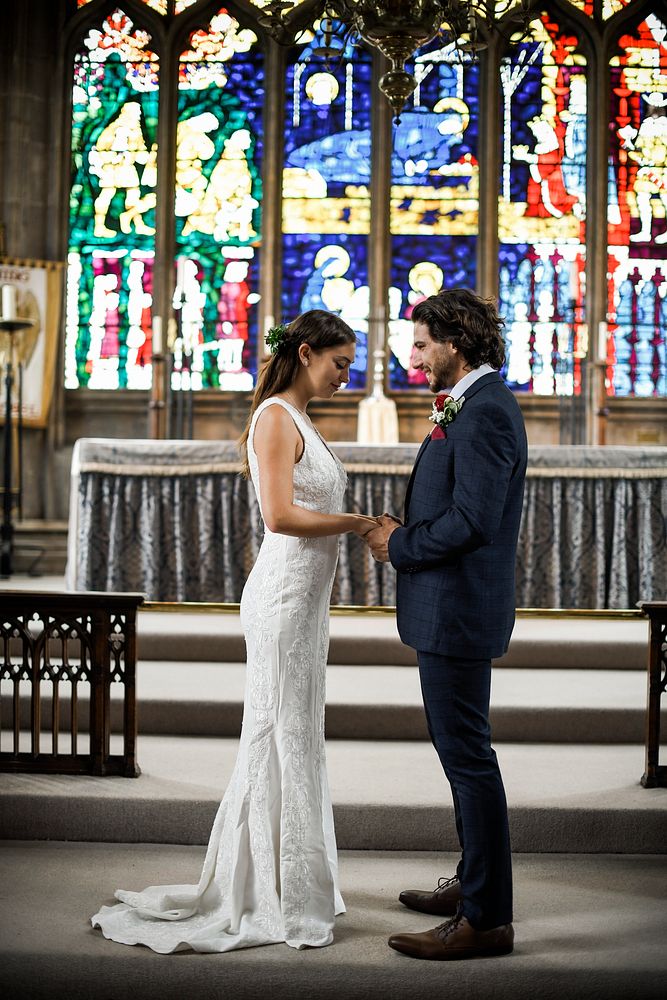 Bride and groom at the altar | Premium Photo - rawpixel