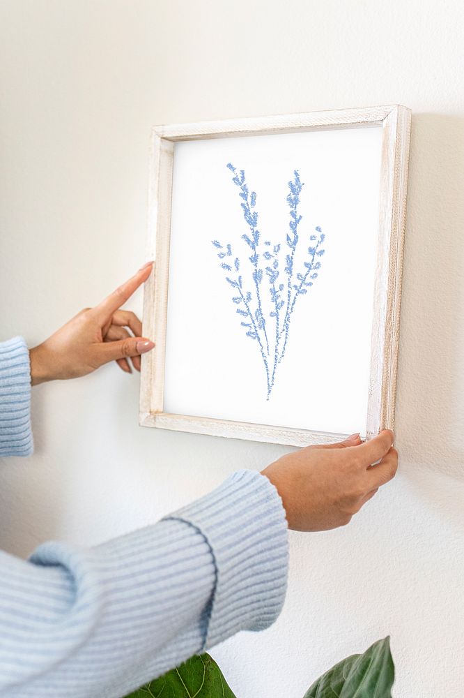 Curator hanging picture frame wall | Premium Photo - rawpixel