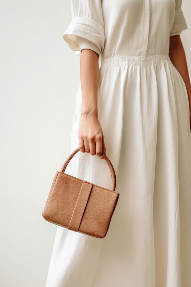 Woman hand holding bag handbag | Premium Photo - rawpixel