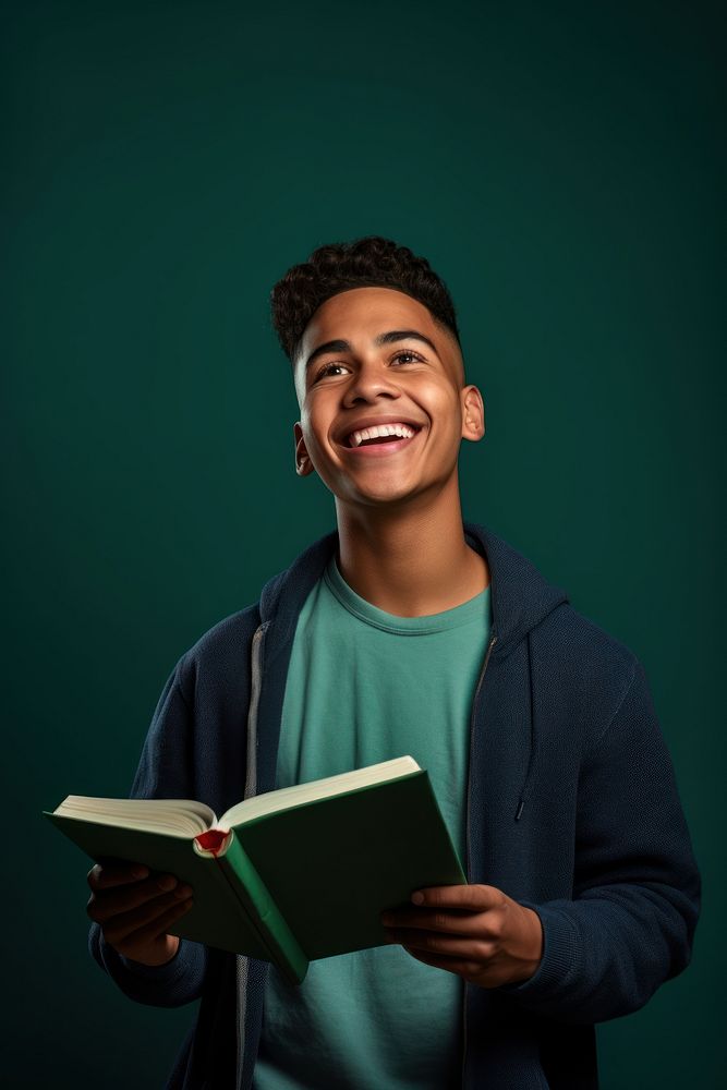 Student holding book and pencil | Premium Photo - rawpixel