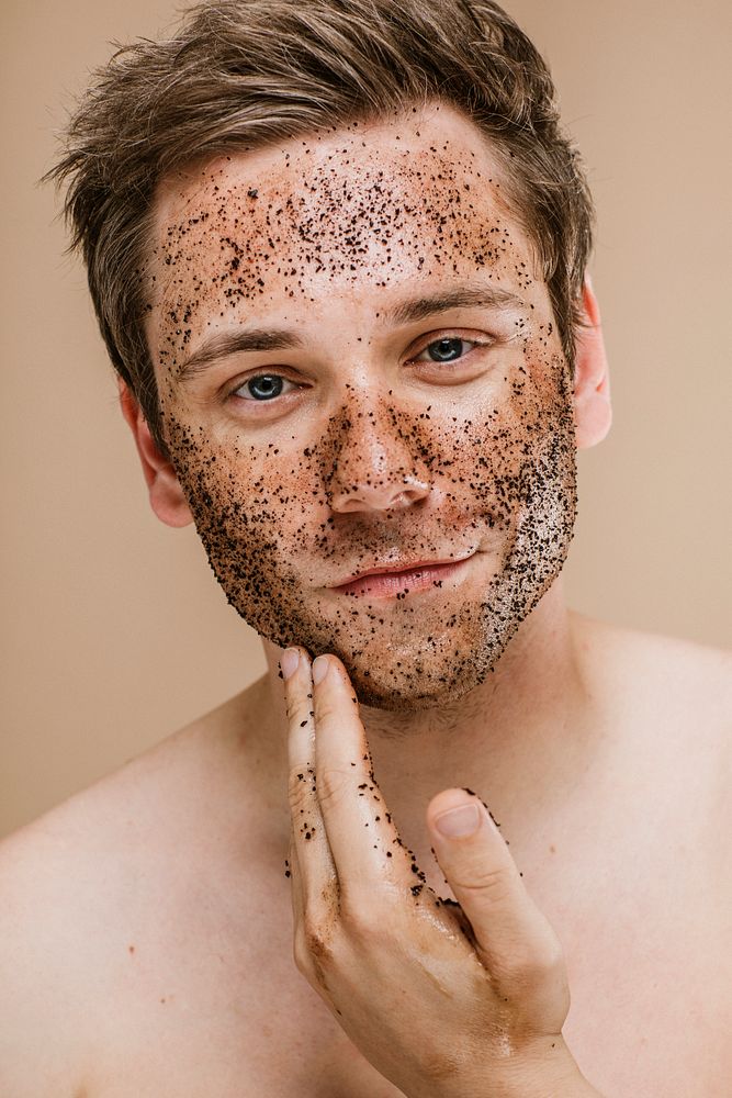 Man doing a face scrub | Premium Photo - rawpixel