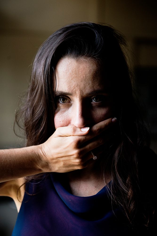 Woman hand covered her mouth | Premium Photo - rawpixel