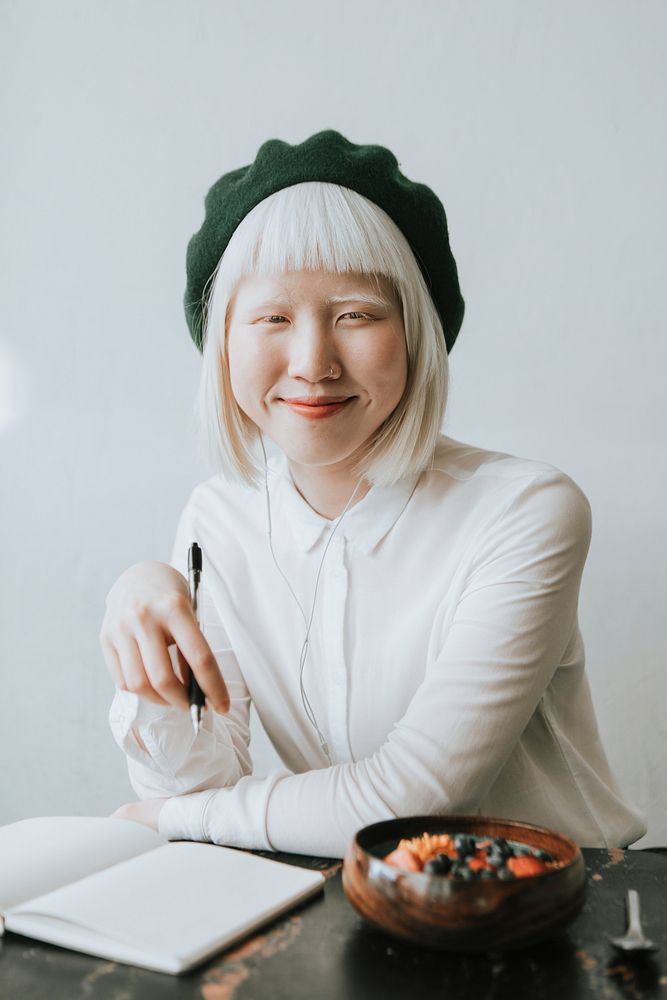 Cute albino woman writing her | Premium Photo - rawpixel