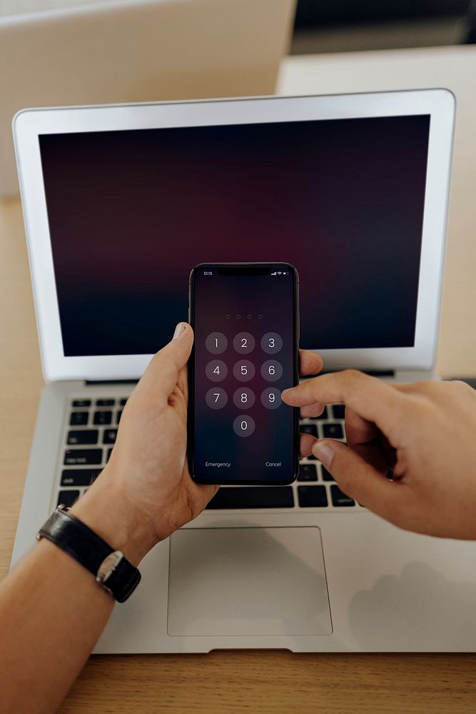 Closeup man unlocking mobile phone | Premium PSD Mockup - rawpixel
