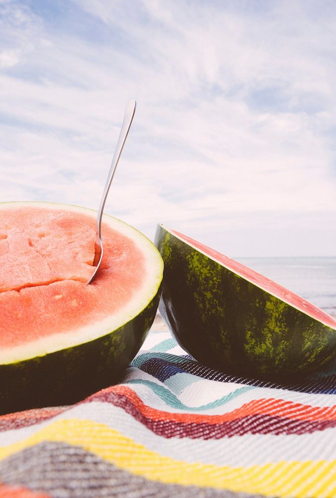 Two watermelon halves on the beach | Free Photo - rawpixel