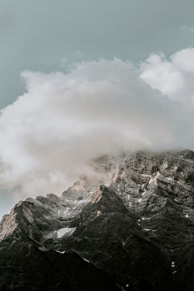 Clouds over a rugged summit | Free Photo - rawpixel