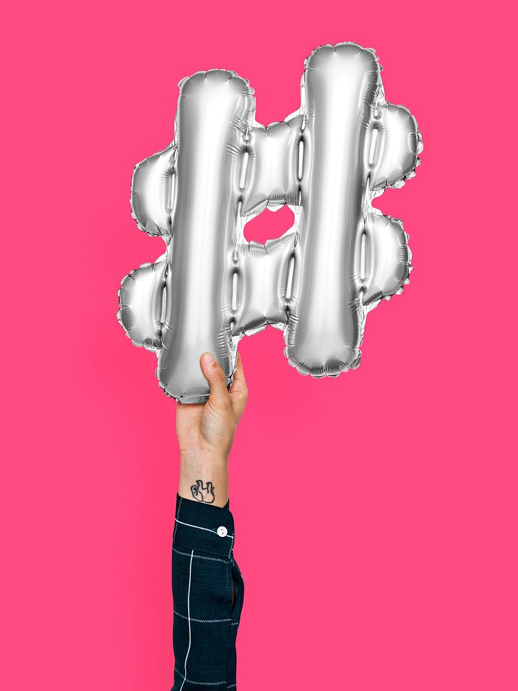 Hand holding balloon hashtag symbol | Free Photo - rawpixel