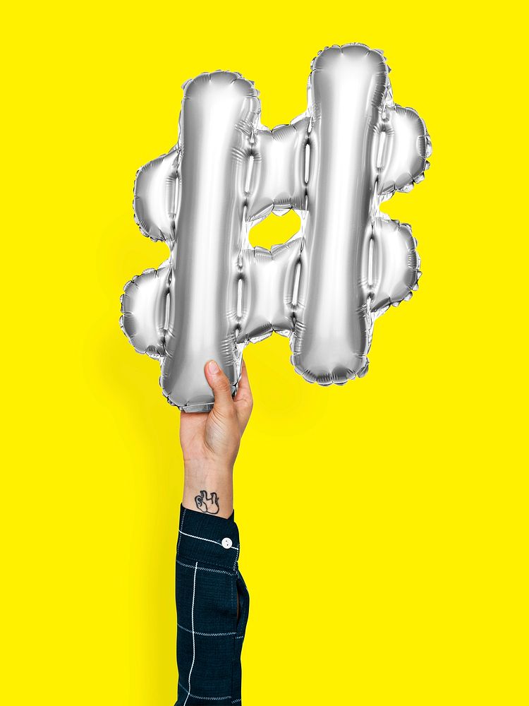 Hand holding balloon hashtag symbol | Free Photo - rawpixel