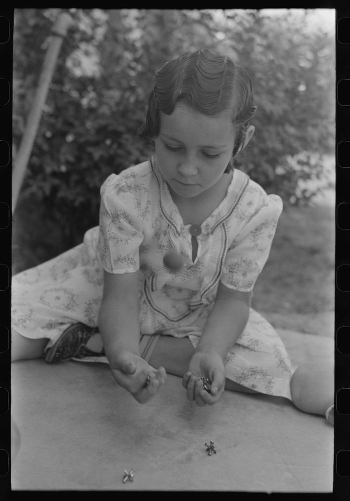 Little girl playing jacks Casa | Free Photo - rawpixel