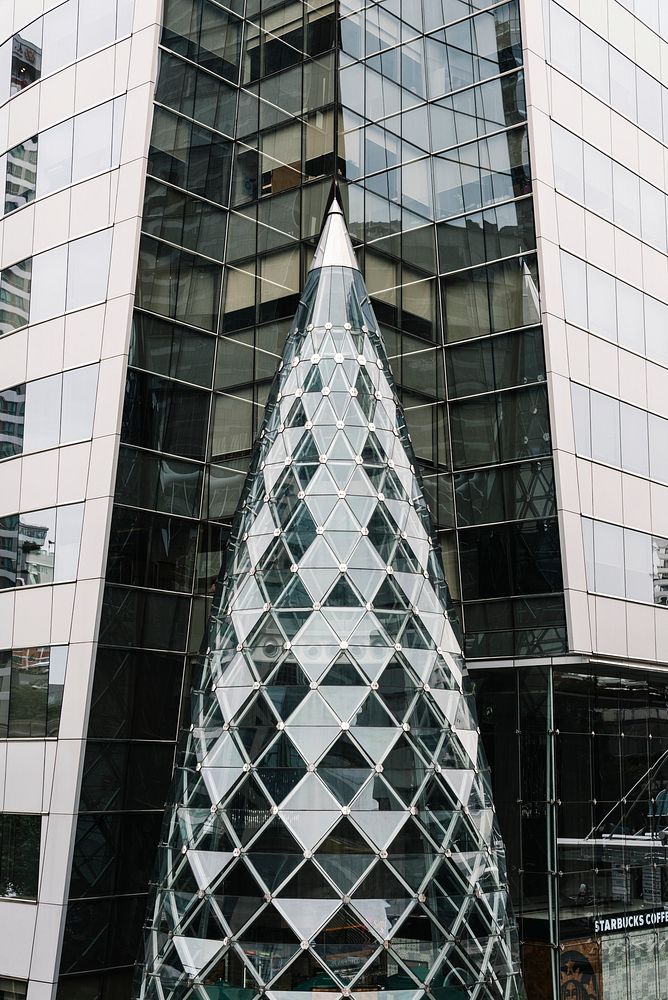 Christmas tree construction outside building | Free Photo - rawpixel