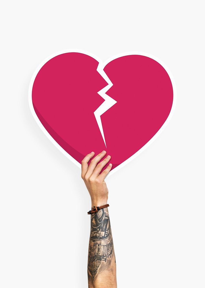 Hand holding broken heart cardboard | Premium PSD - rawpixel