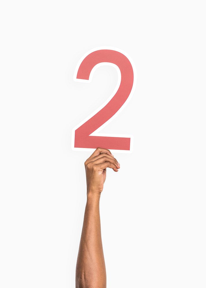 Hands holding a number two | Free Photo - rawpixel