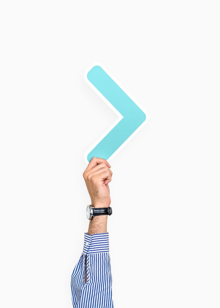 Hand holding a greater-than sign | Premium PSD - rawpixel