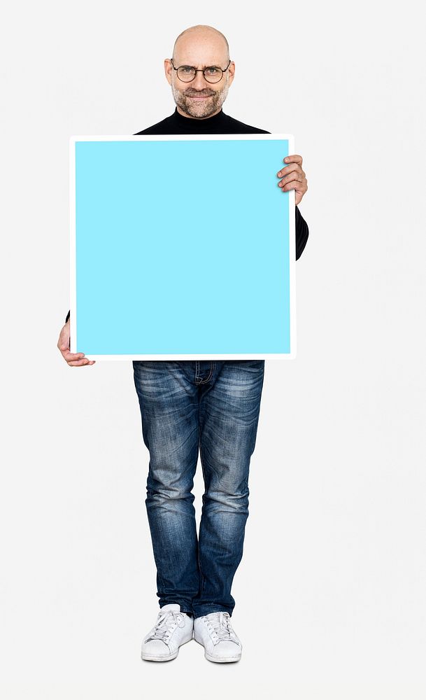 A cheerful man holding a square | Premium PSD - rawpixel