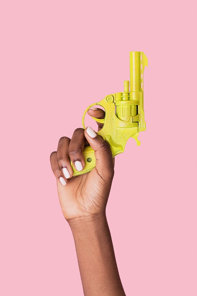 Hand holding gun raising isolated | Premium Photo - rawpixel
