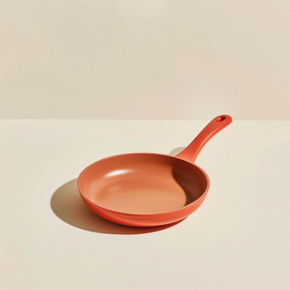 Modern nonstick orange frying pan | Free Photo - rawpixel