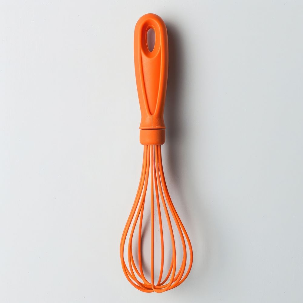 Orange kitchen whisk tool | Free Photo - rawpixel