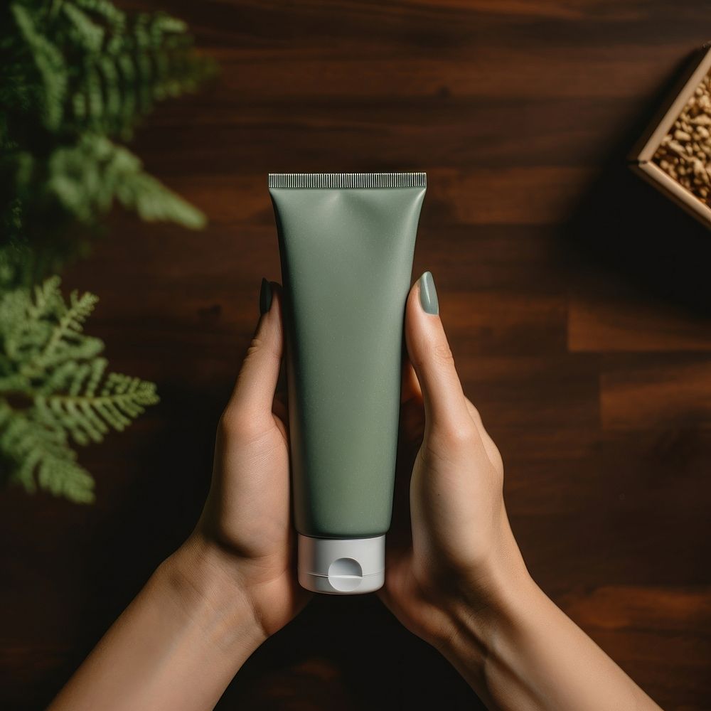 Cosmetic tube packaging cosmetics hand | Premium Photo - rawpixel
