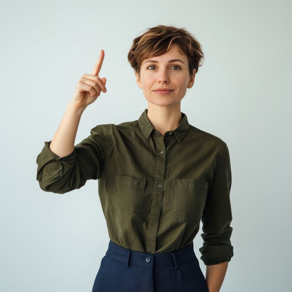 Woman pointing shirt portrait photo. | Free Photo - rawpixel