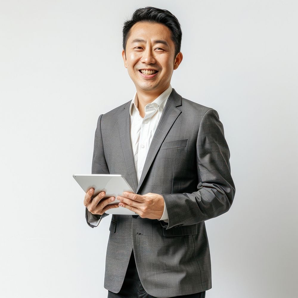 Smart Chinese businessman suit tablet | Free Photo - rawpixel