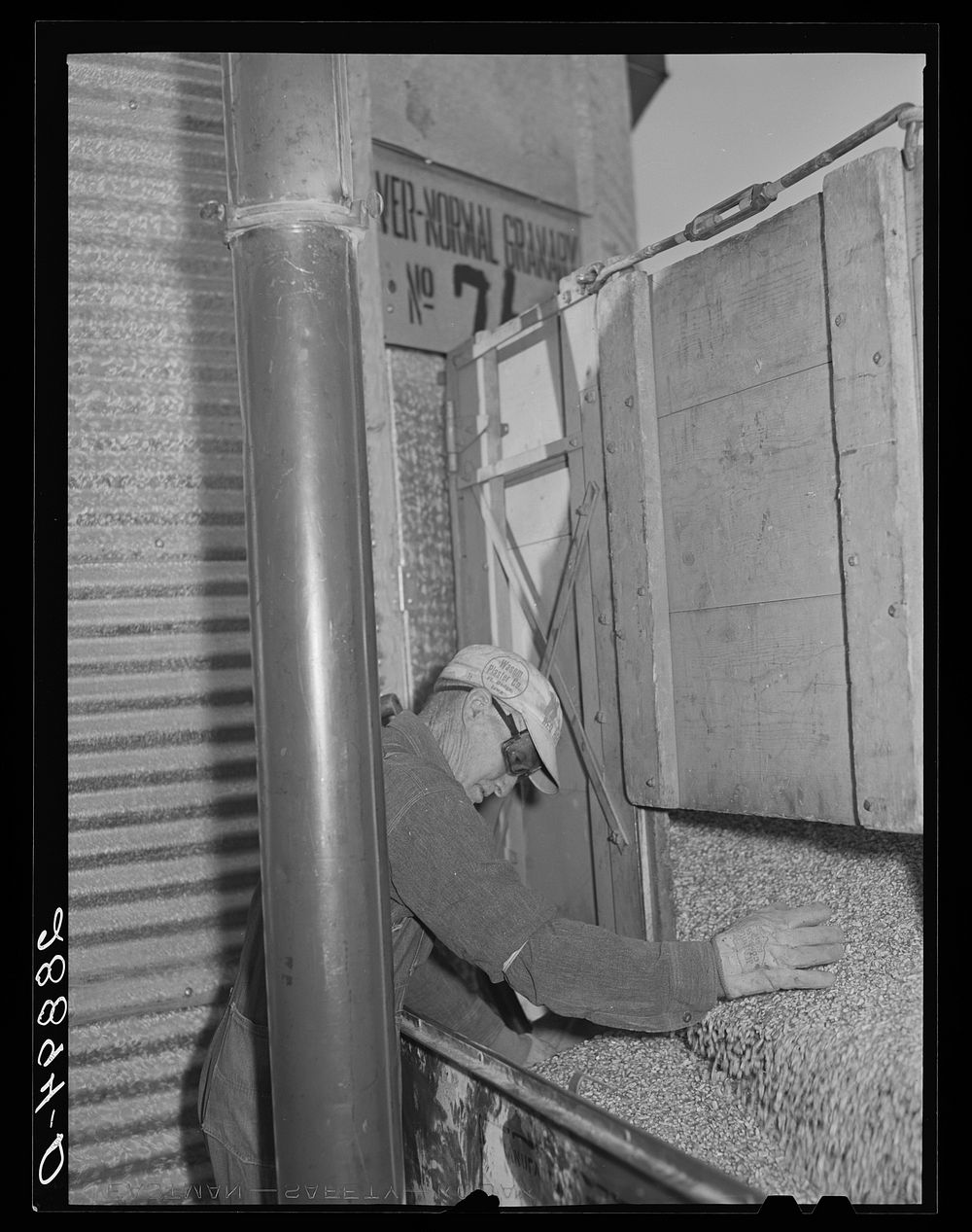 Storing corn ever-normal granary bin. | Free Photo - rawpixel
