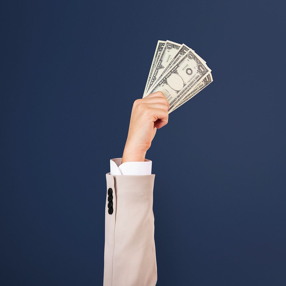 Hand holding money finance concept | Free Photo - rawpixel