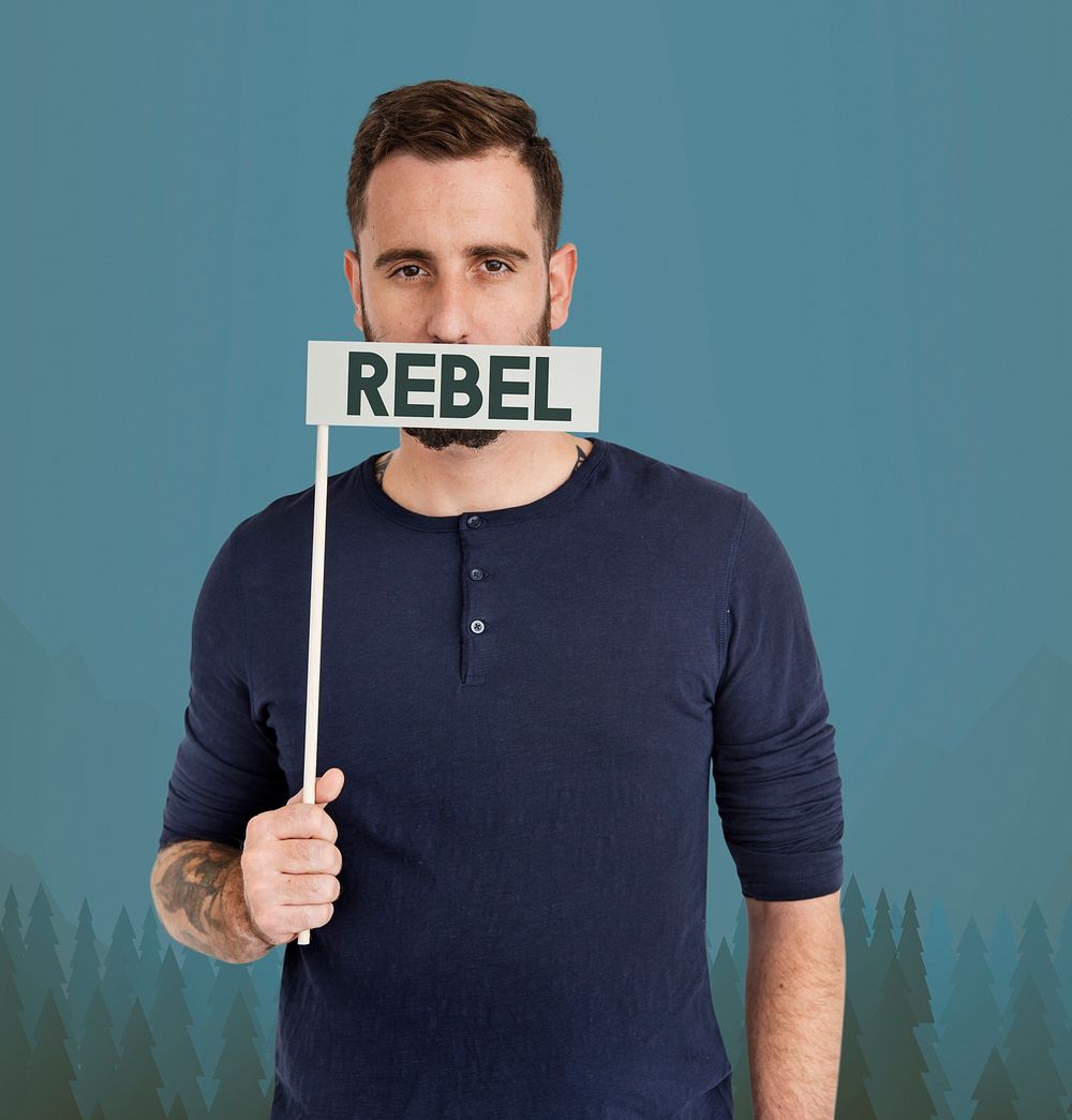 Man holding rebel sign | Free Photo - rawpixel