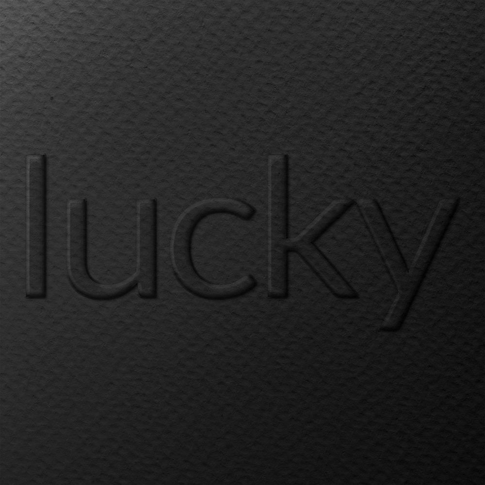 Lucky word embossed typography paper | Free Photo - rawpixel