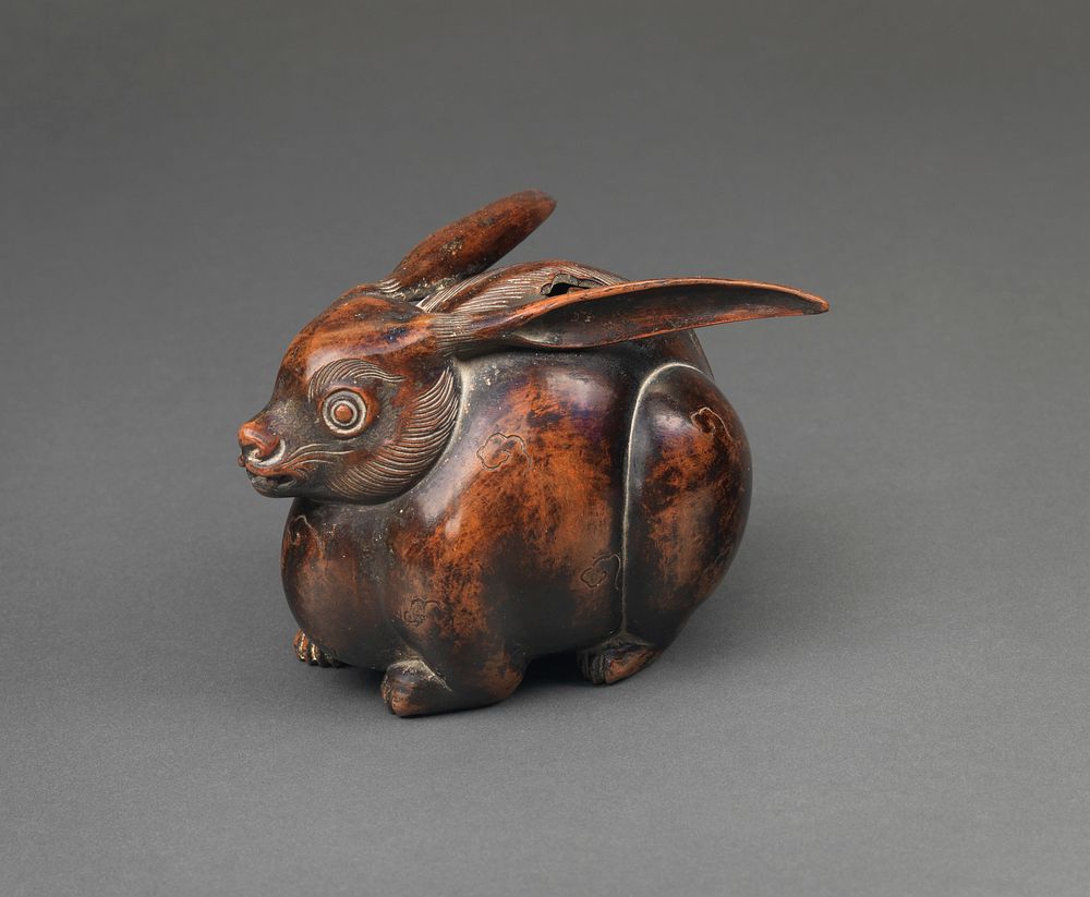 Fat, round metal rabbit figure; | Free Photo - rawpixel