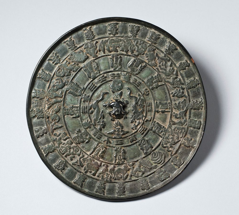 round bronze medallion with raised | Free Photo - rawpixel