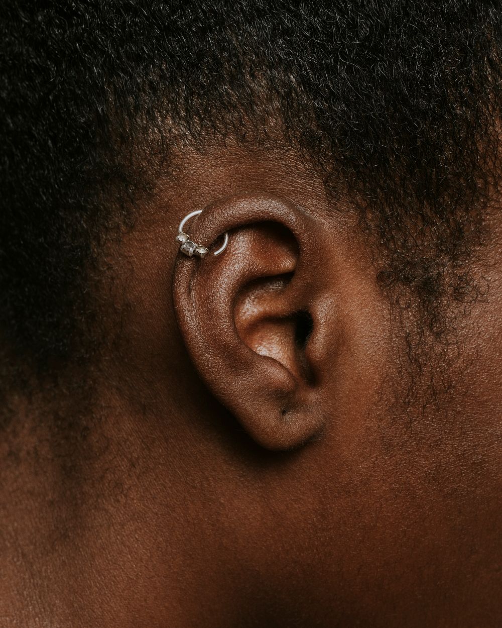 African woman wearing ear piercing, | Premium Photo - rawpixel
