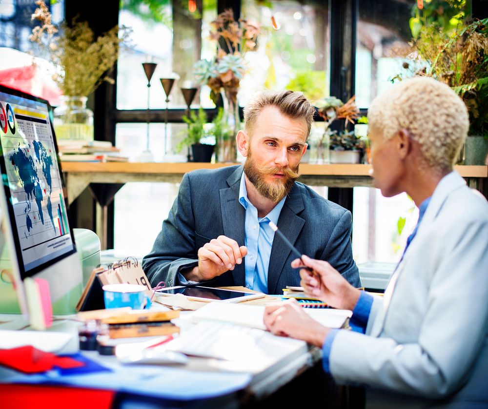 Colleagues working with each other | Premium Photo - rawpixel