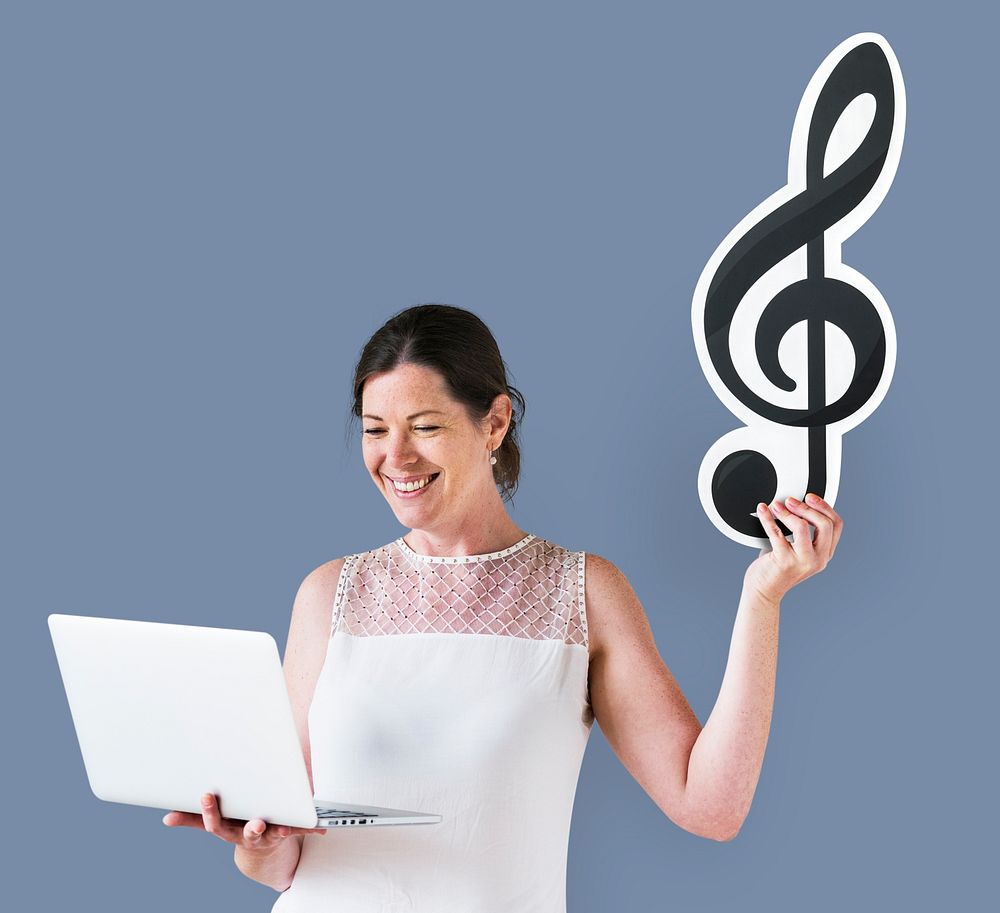 Woman holding a musical note | Premium Photo - rawpixel