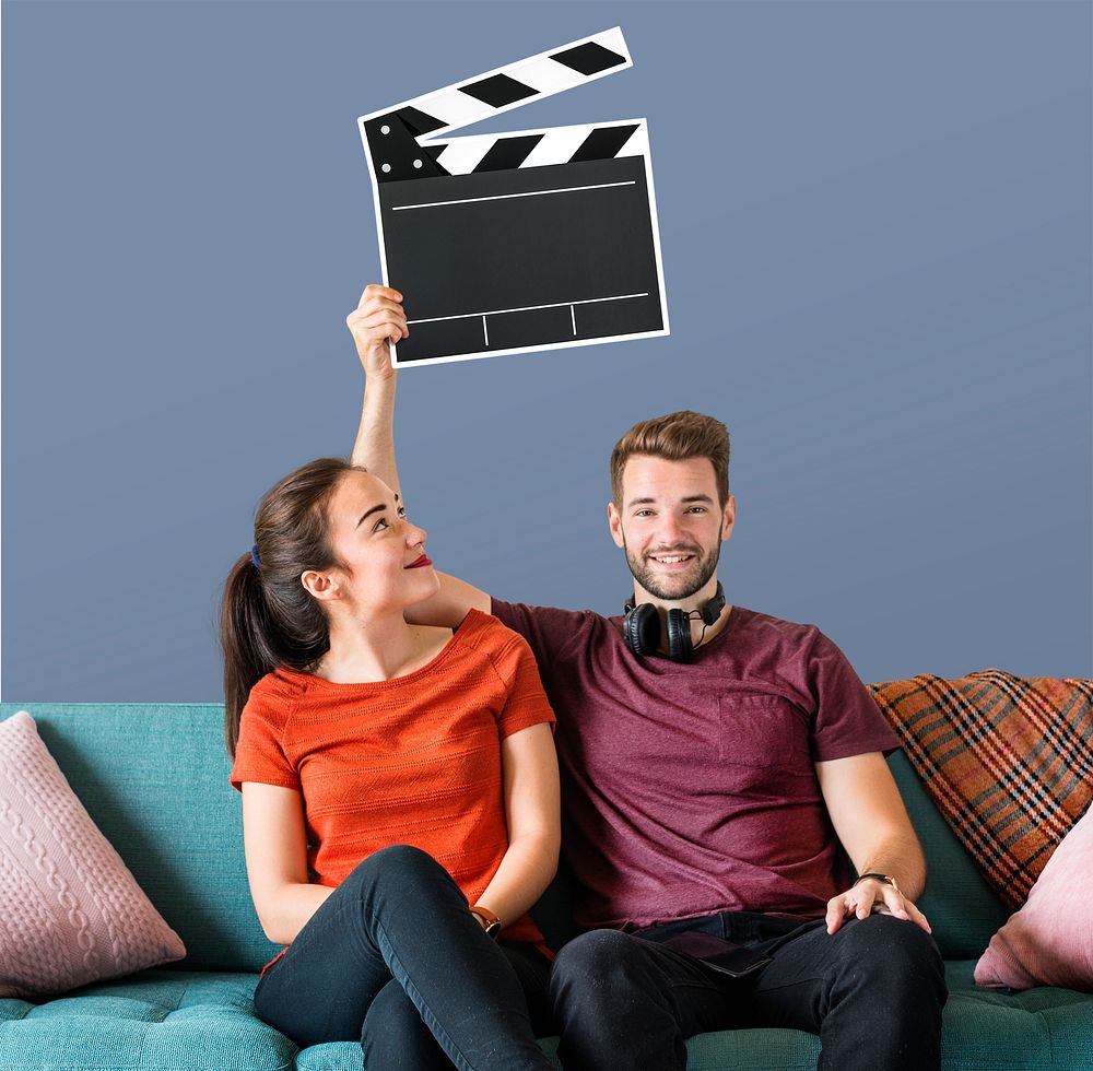 Young couple holding clapper icon | Premium Photo - rawpixel