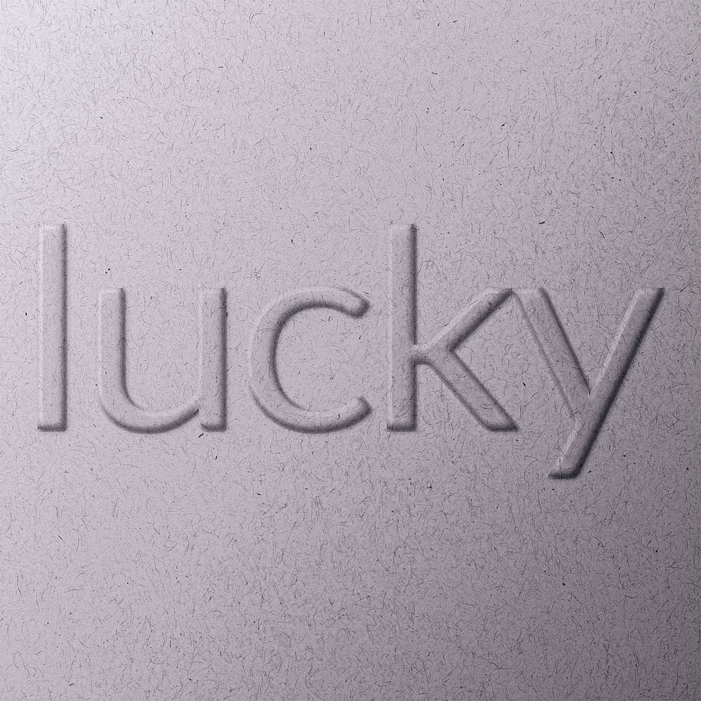 Lucky word embossed typography paper | Free Photo - rawpixel