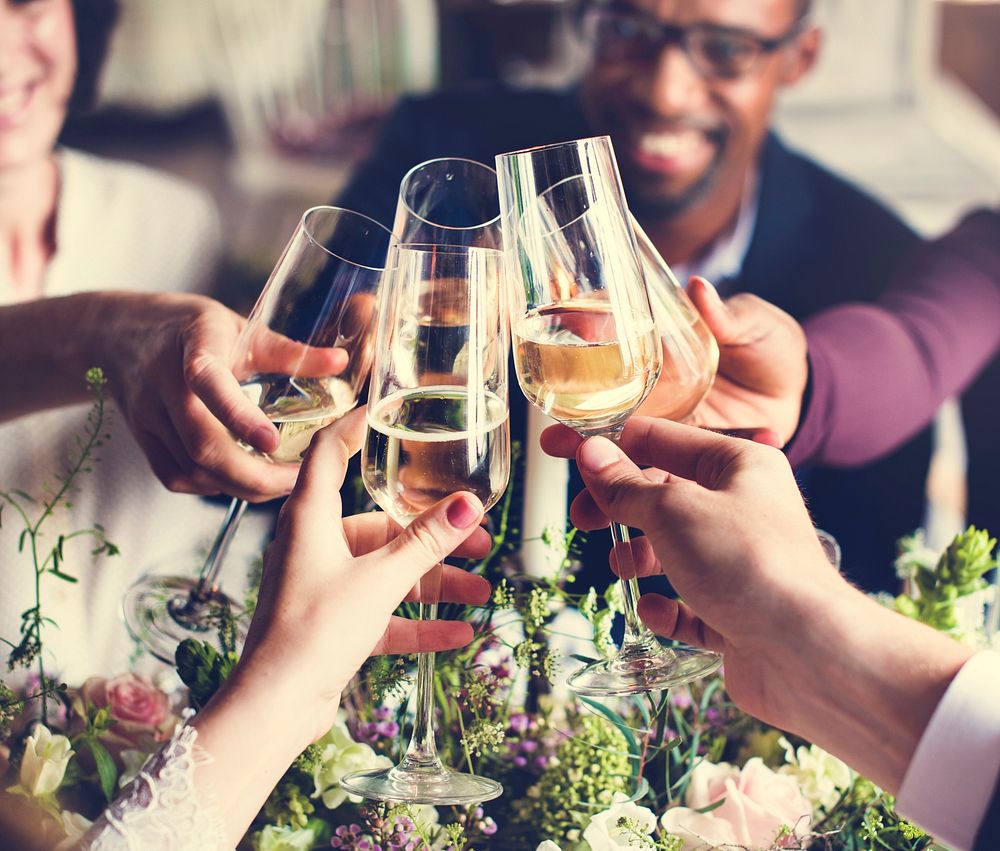 People doing a toast at the table | Premium Photo - rawpixel