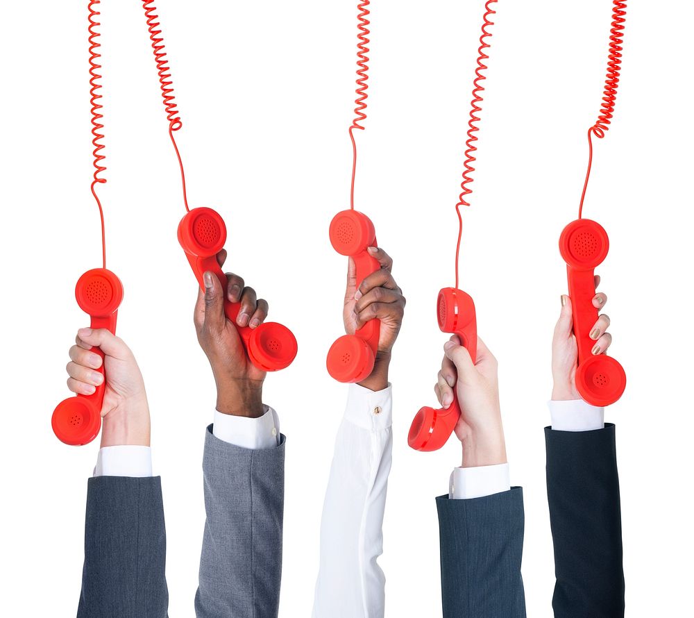Business people holding red telephone. | Free Photo - rawpixel