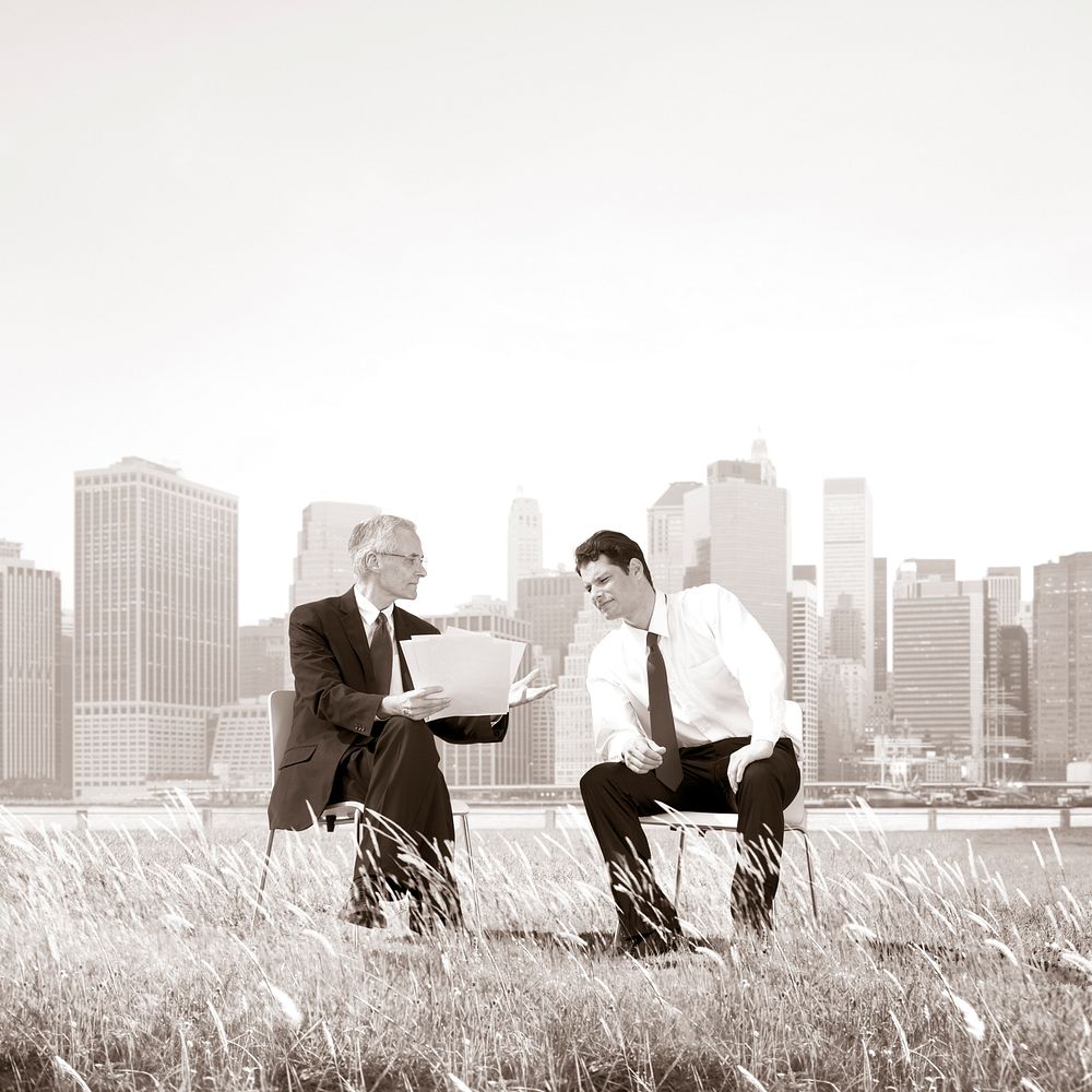 Two Business Men Discussion Documents | Premium Photo - rawpixel