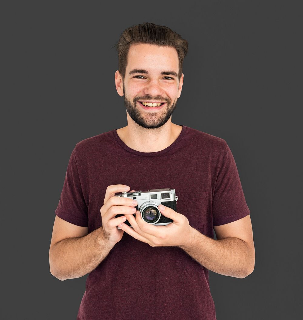 Cheerful Guy Man Holding Camera | Premium Photo - rawpixel