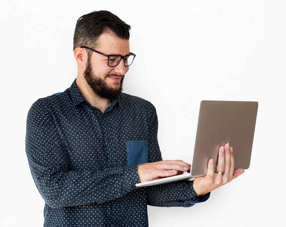 Man standing and holding laptop | Premium Photo - rawpixel