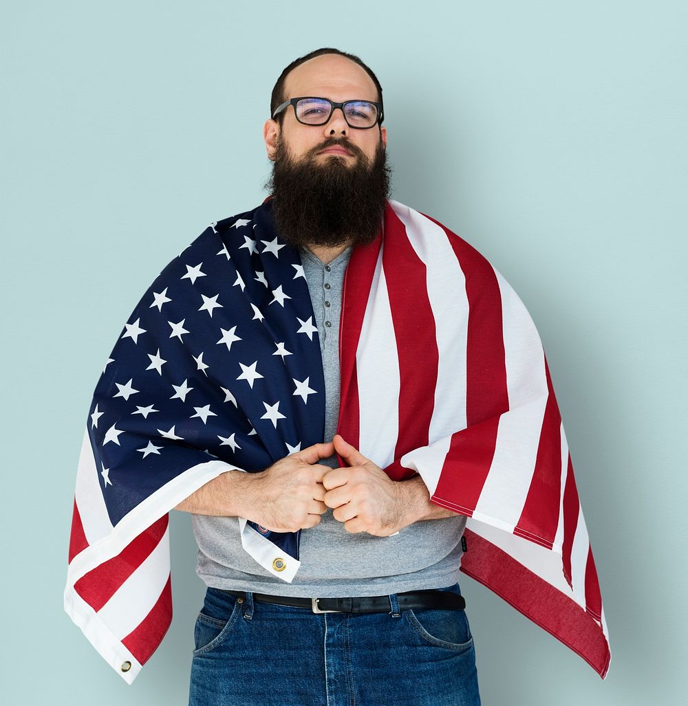 Man holding flag and posing | Premium Photo - rawpixel