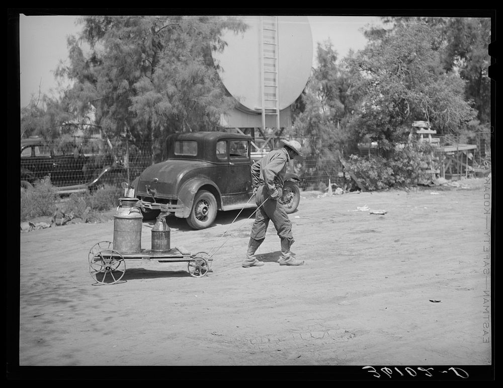 Man hauling home water. Phoenix, | Free Photo - rawpixel