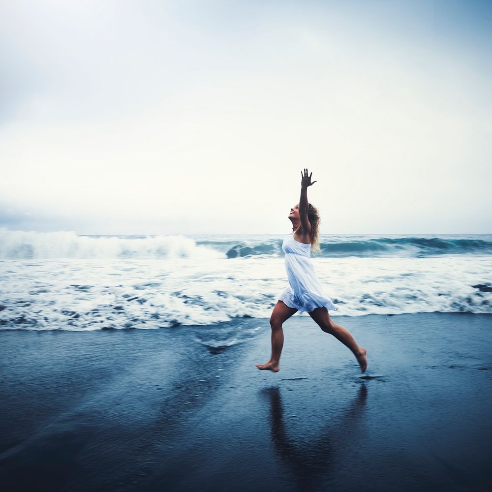 Casual Woman Celebrating Life by the Beach | Premium Photo - rawpixel
