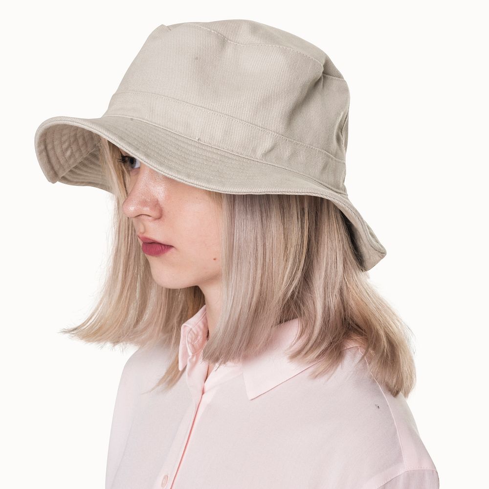 Teenage girl beige bucket hat | Free Photo - rawpixel